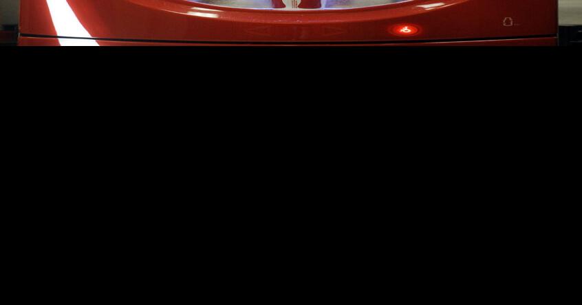 Coke’s touchy-feely campaign: Hug a vending machine for a free can