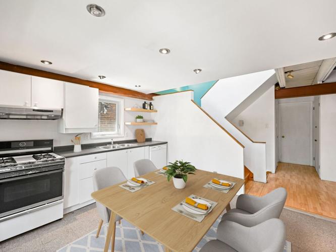 Inside this $980K ‘true hard loft’ townhouse in Toronto