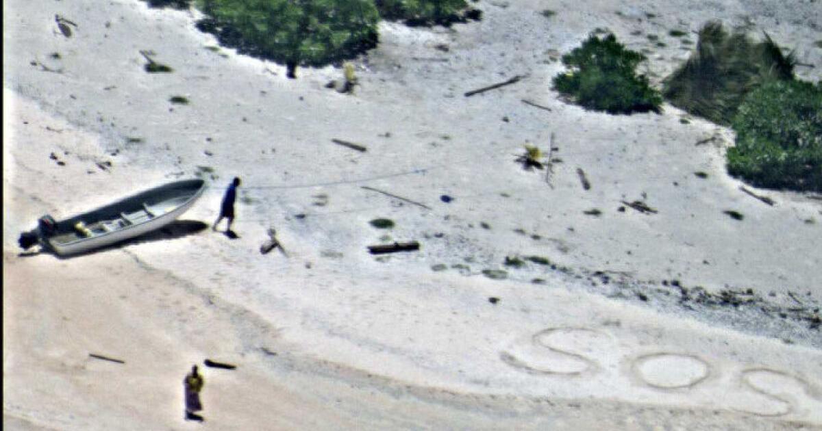 ‘SOS’ in sand leads to rescue of sailors stranded on island