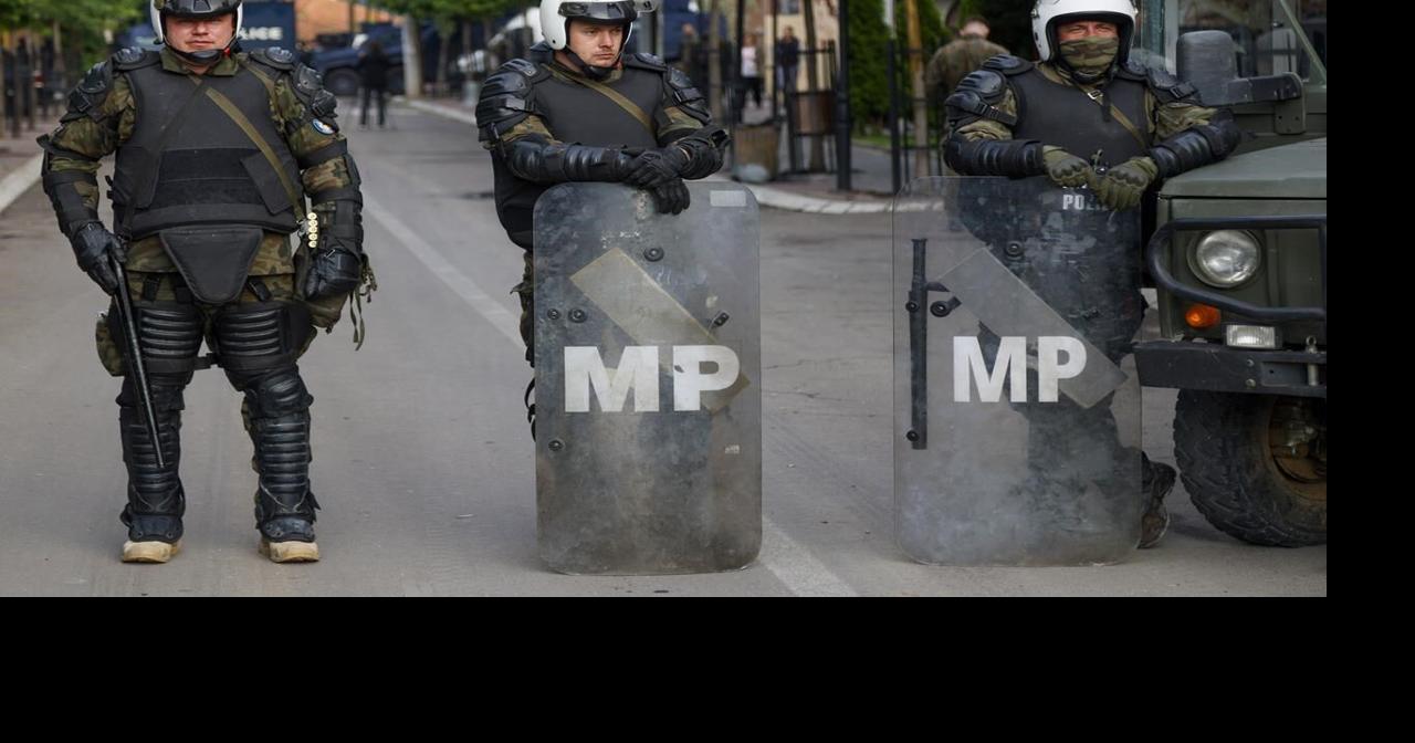 Kosovo Serbs gather to take over municipality buildings in the north