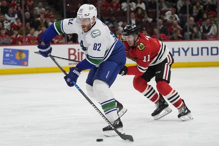 Garland, Joshua pace Canucks to 4-2 win over Blackhawks
