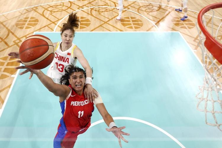 China beats Puerto Rico in Olympic women's hoops, puts itself in ...