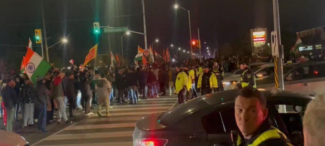 Tempers flare at protest Monday after violence outside Hindu temple in ...