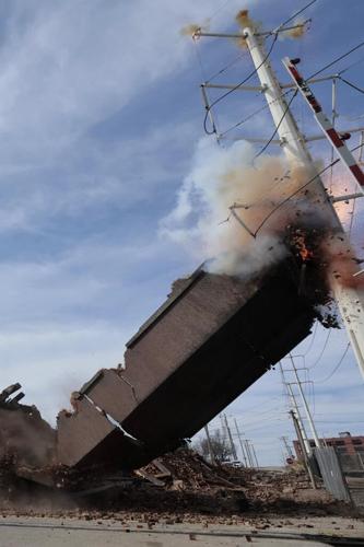 St. Louis wrecking crew knocks wall into transmission tower during ...