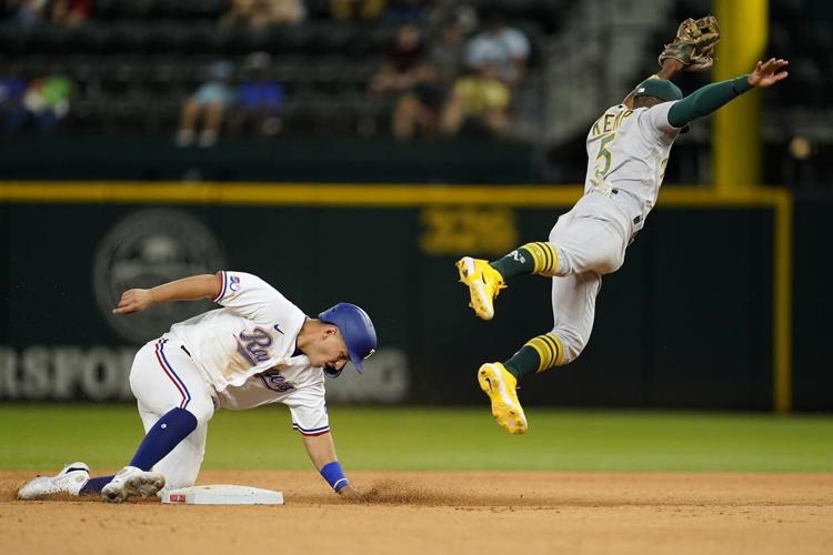 A’s rally for 2 in 9th, use Seager’s error to beat Rangers