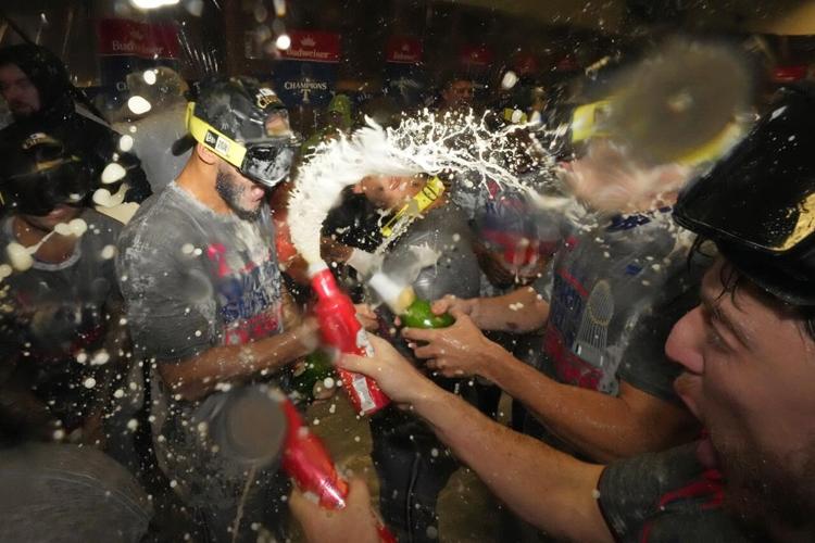 Security prevents Rangers from celebrating in Chase Field pool after ...