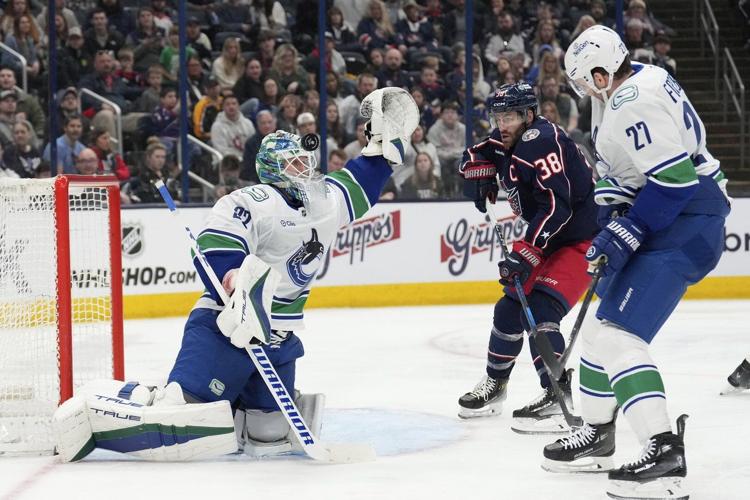 Jenner scores twice, Blue Jackets rally for 7-6 victory over Canucks in ...