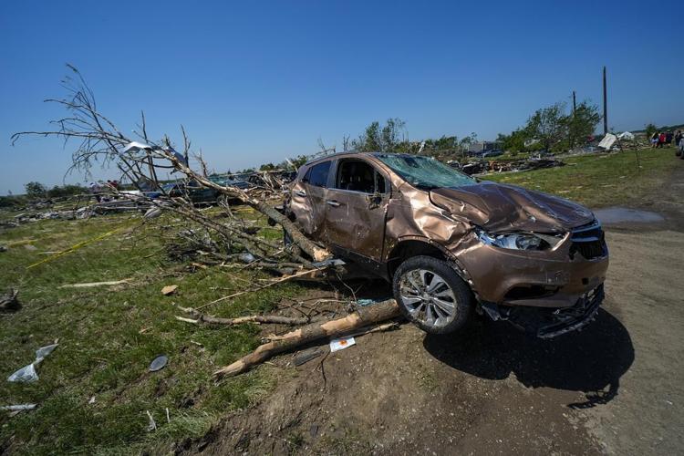 In a north Texas county, dazed residents sift through homes mangled by a tornado