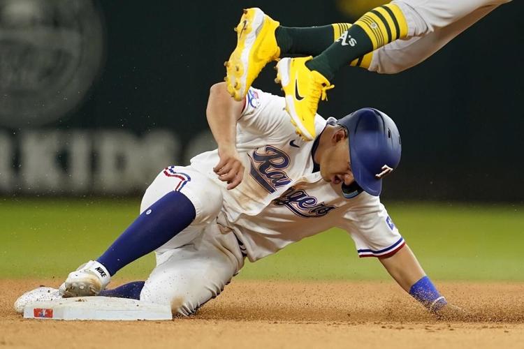 A’s rally for 2 in 9th, use Seager’s error to beat Rangers