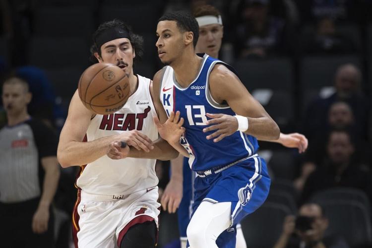 The short-handed Heat beat the Kings 121-110 for their 4th straight win