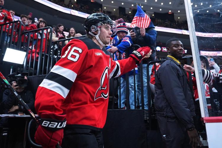 Olympic star Jack Hughes returns to NHL, jokes about his missing teeth ...