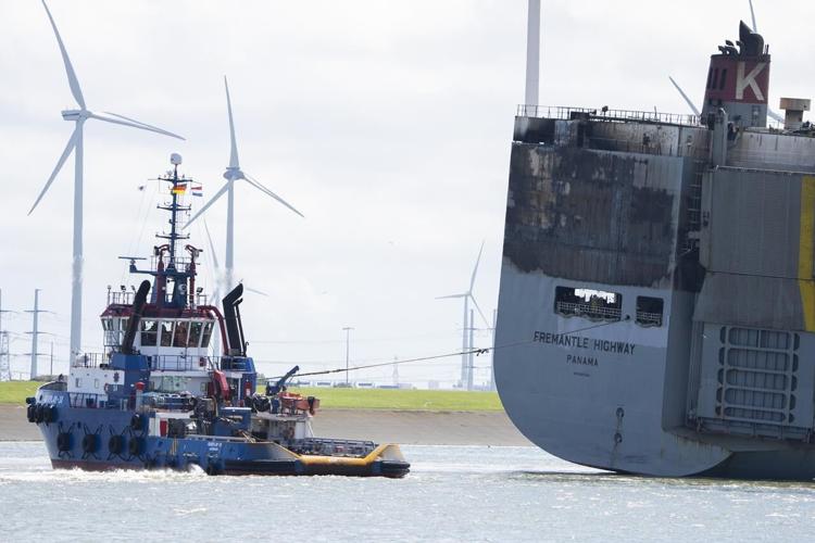A car-carrying ship that burned for a week on the North Sea is towed to ...