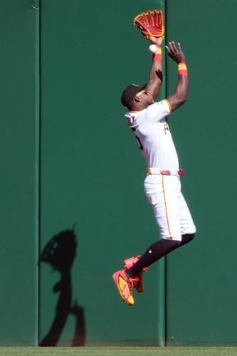 Jake Mangum homers and drives in 2 runs as Pirates hold off Twins 10-9