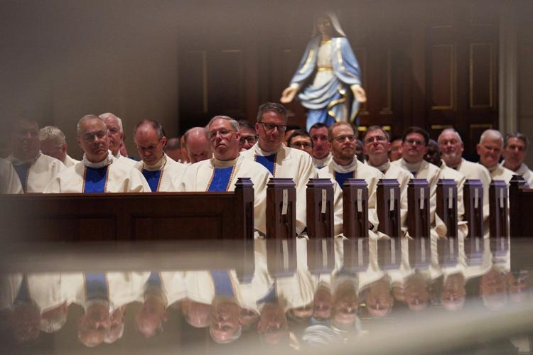 Photos of 12 men who became Catholic priests in the US