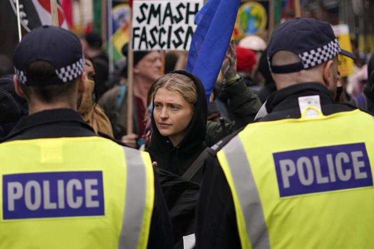 Supporters of far-right British figure rally as anti-racism ...