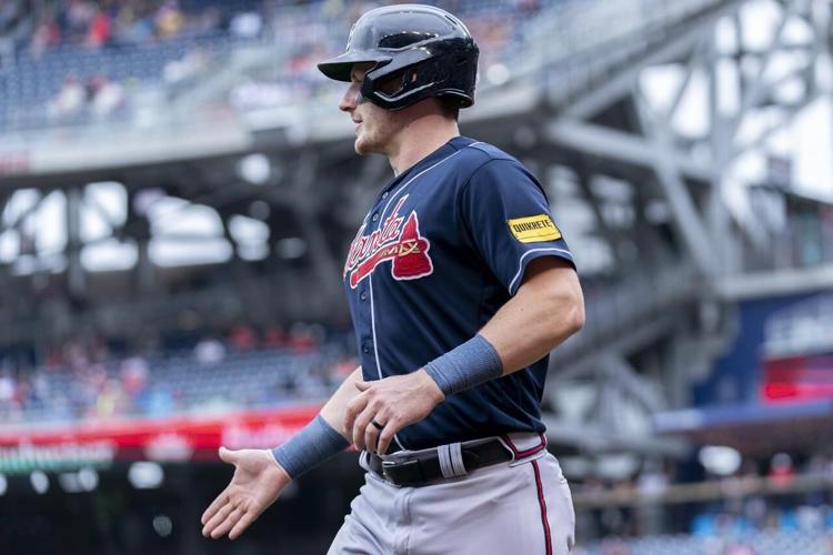 Braves reach 100 wins again, beat Nationals 8-5 behind Strider to ...
