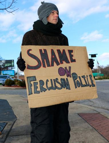 Why a town librarian has spent 102 days standing in front of Ferguson’s ...