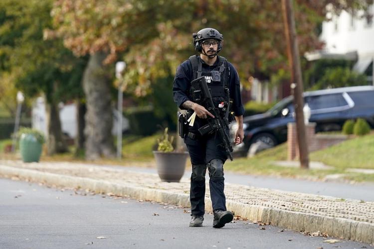 2 police officers shot in Newark; suspect at large
