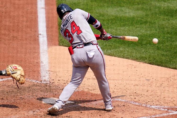 Almonte fuels rally as Braves surge past Pirates 14-3