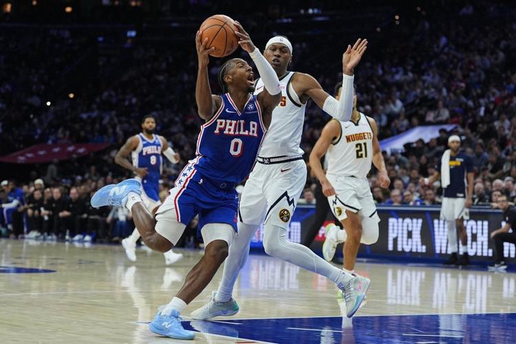 Brown's goaltended layup in OT lifts short-handed Nuggets over 76ers ...