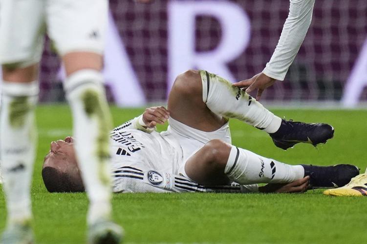 Injured Mbappé jeered in Real Madrid's quarterfinal exit in the ...