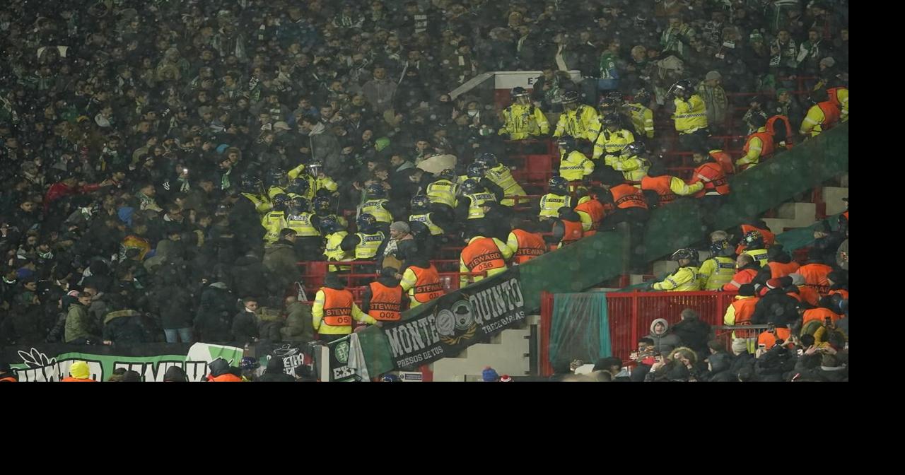 Riot police control crowd unrest at Old Trafford