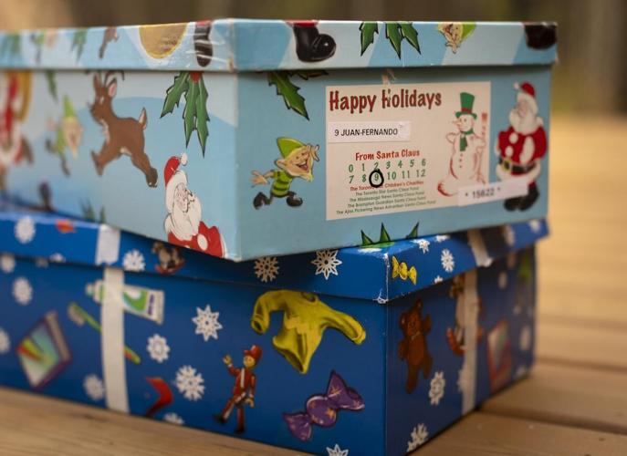 Santa Claus Fund gift box recipient now an organizer