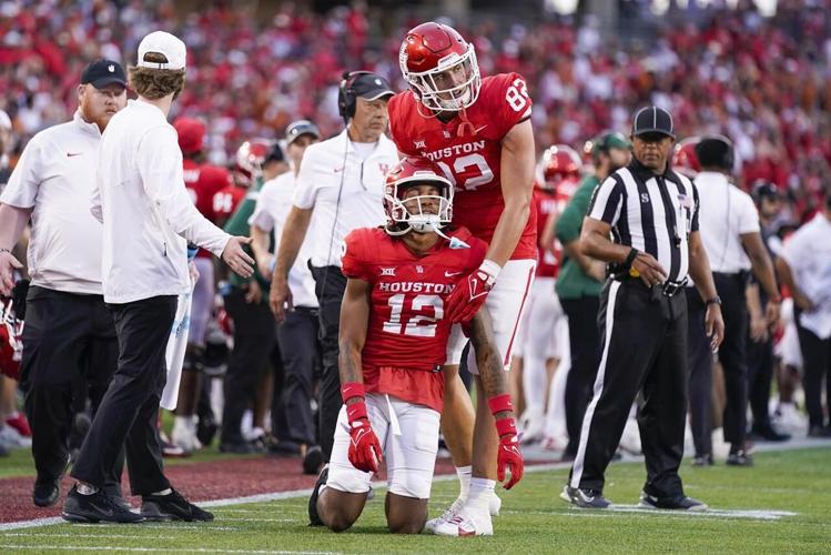 CJ Baxter scores late TD and No. 8 Texas derails Houston's last-chance ...