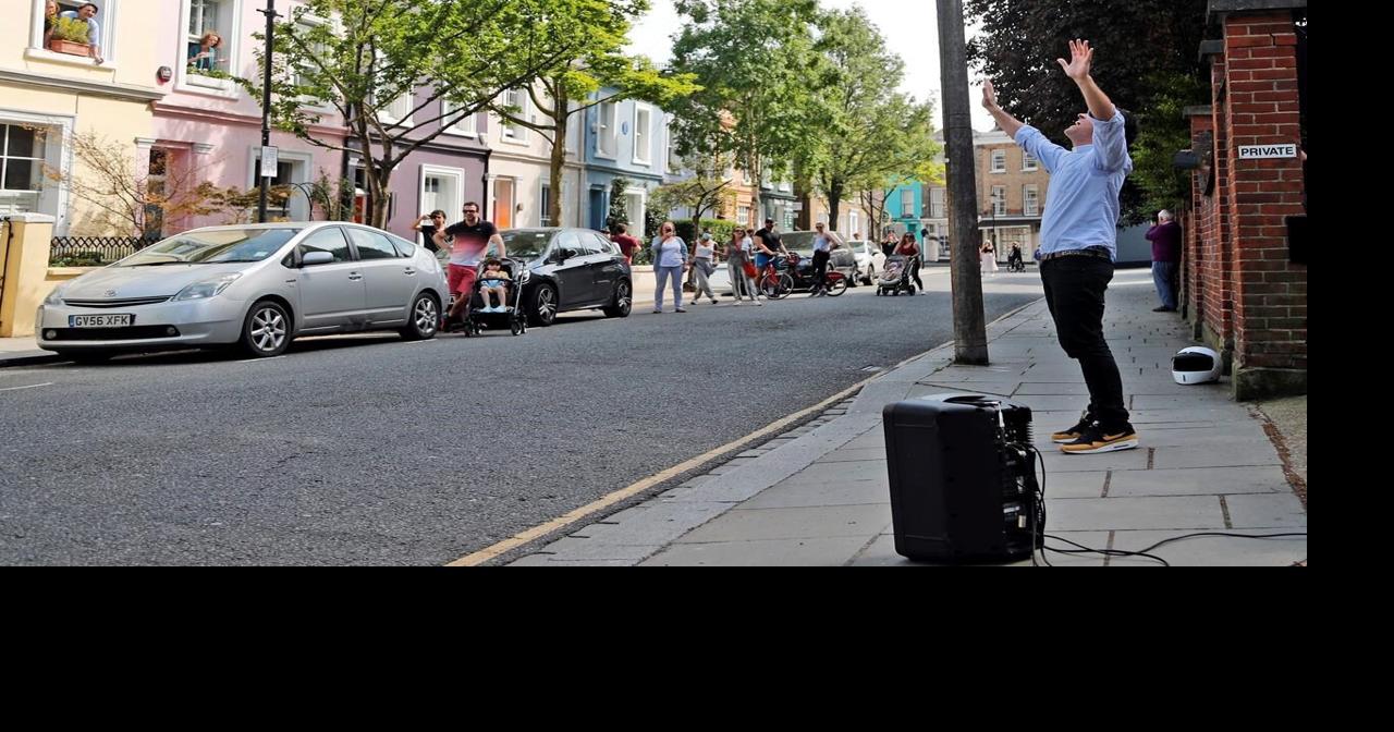 With a bike and loudspeakers, London vicar spreads the word