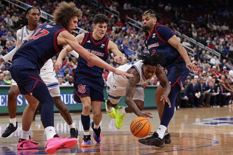 Ejiofor powers No. 18 St. John's past Seton Hall 72-65 for at least a ...