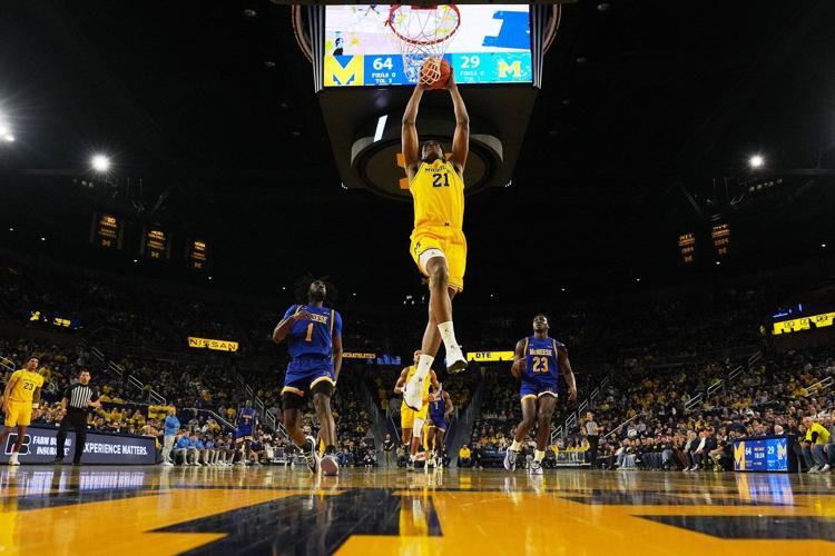Morez Johnson Jr. has 24 points and 11 rebounds as No. 2 Michigan routs ...