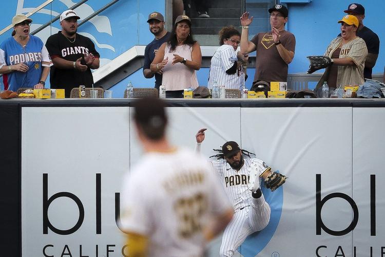 Sheets hits 2 of San Diego's 4 homers, Tatis robs Devers as the Padres beat the Giants 8-1