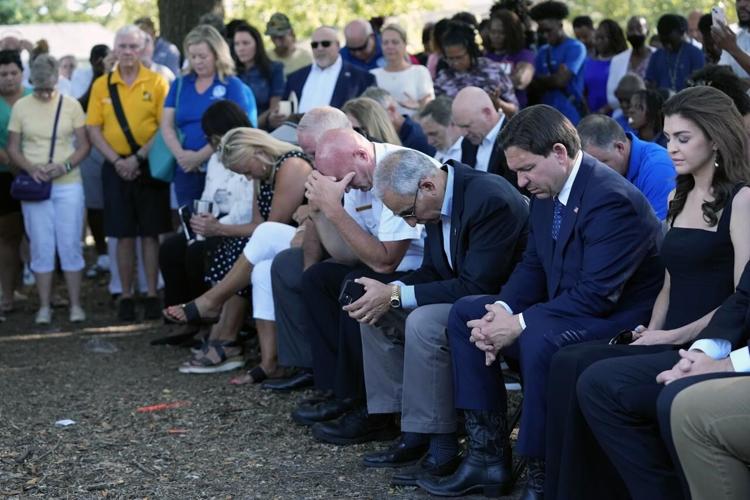 Florida Gov. Ron DeSantis booed at vigil as hundreds mourn more racist ...
