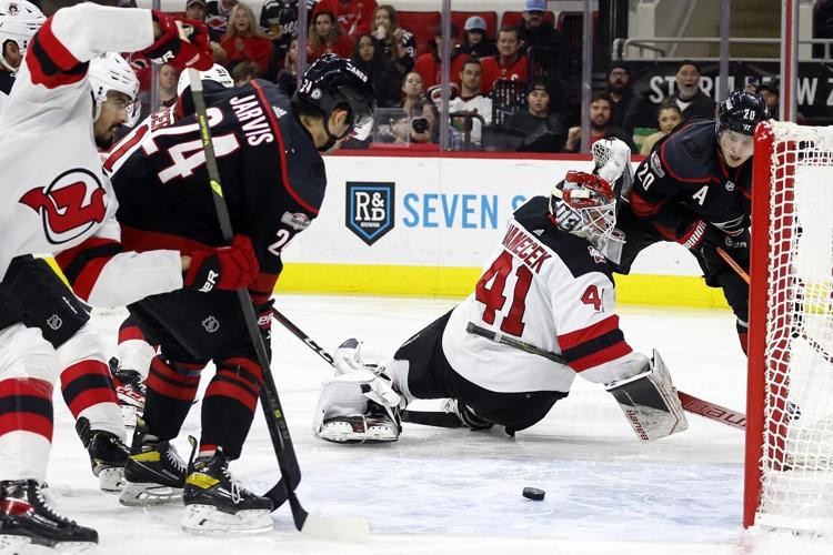 Mercer scores 2, Devils use 2nd period rally to top Canes