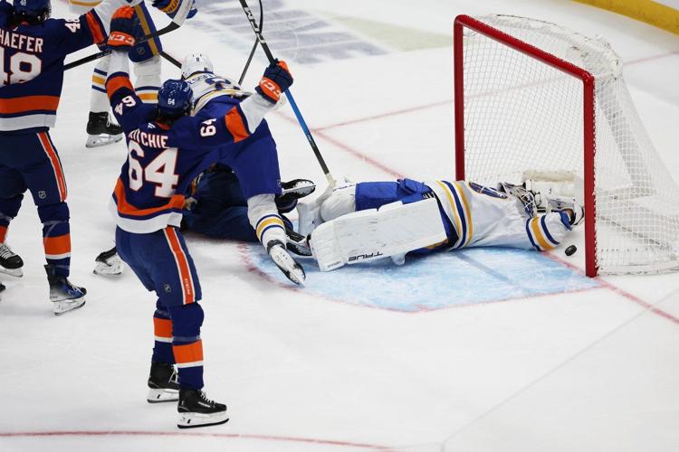 Alex Lyon makes 26 saves, ties Buffalo record with 9th straight win as ...