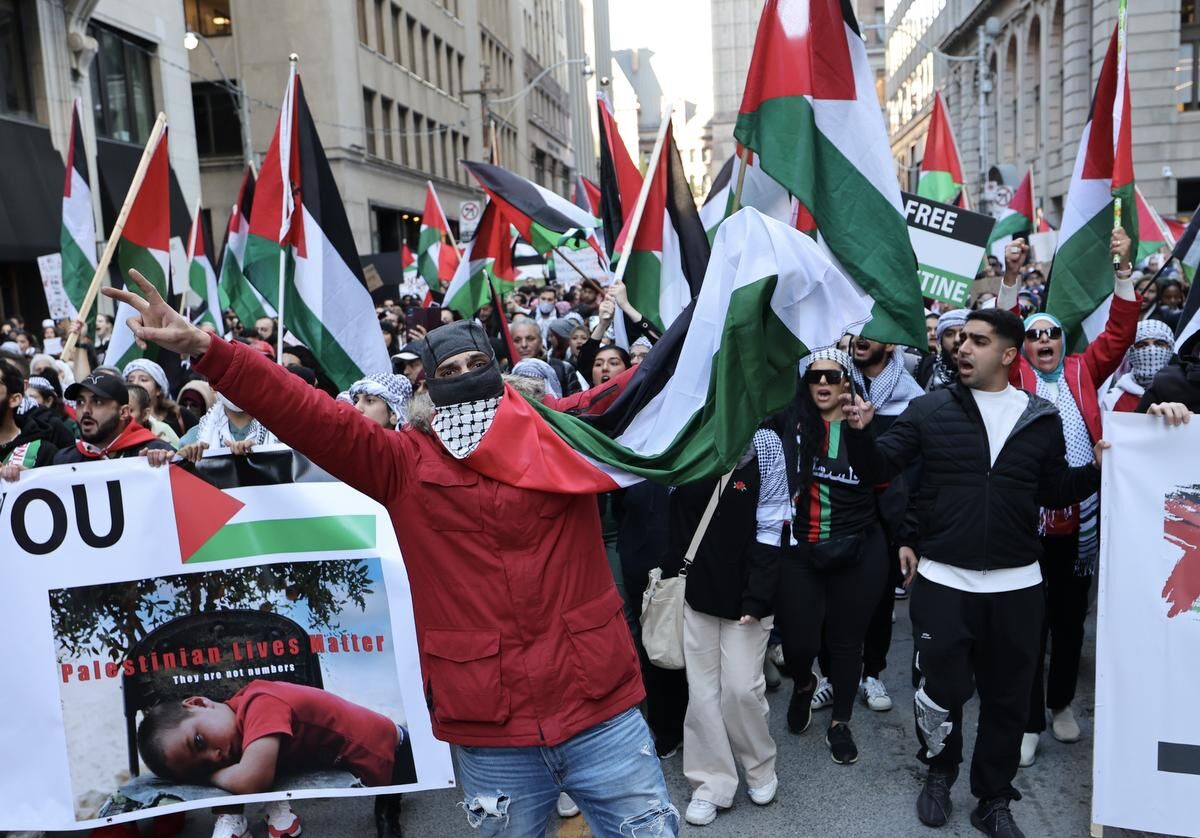 Thousands of protesters take over downtown Toronto streets