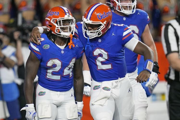 Graham Mertz, Montrell Johnson account for scores as Florida beats UCF ...