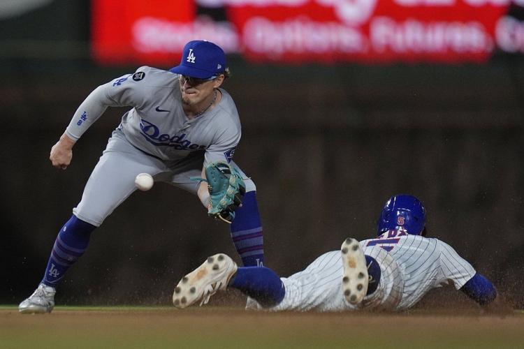 Happ hits game-ending single in the 10th as the Cubs rally past Dodgers ...