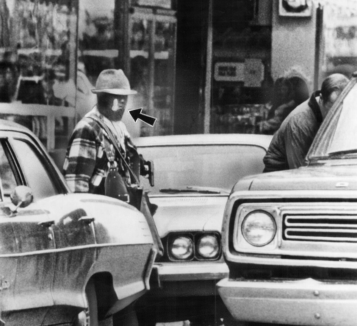 From the Archives: 1,000 see bank robber blown to bits