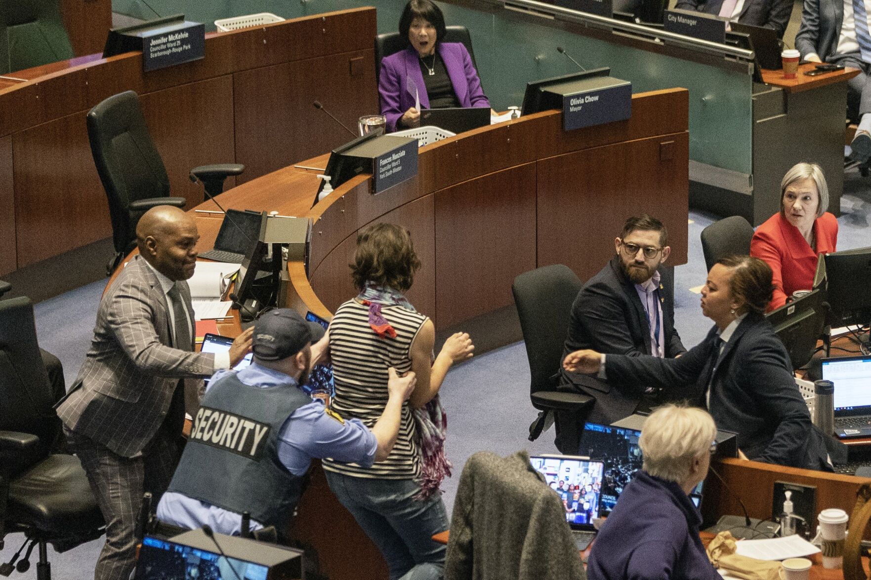 Anti-police protesters disrupt Toronto council budget debate