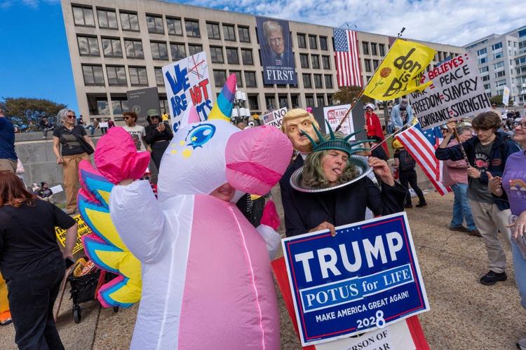 Inflatable costumes used to deflate tensions at rallies against Trump ...