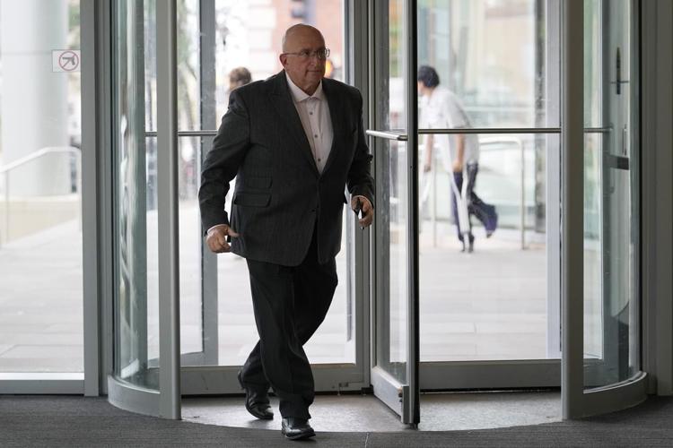 Father charged with helping suspect in July 4 shooting obtain gun ...