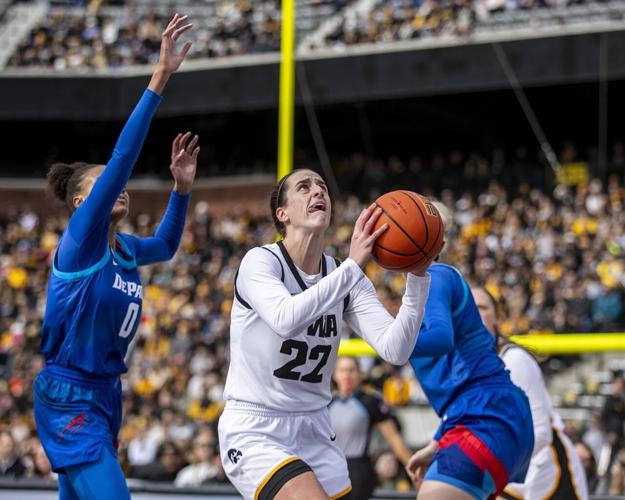 Clark's triple-double highlights game at Kinnick. Women's basketball ...