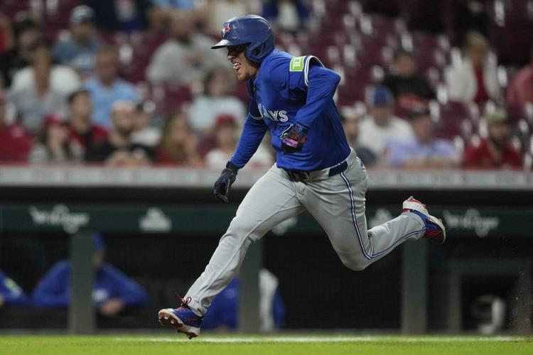 Blue Jays tie season-high with five homers in 13-9 win over Reds