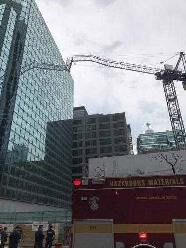 Crane hits building in Toronto, forcing evacuations and road closures