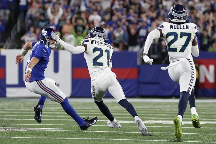 Rookie Devon Witherspoon scores on 97-yard pick-6 as Seahawks' defense ...