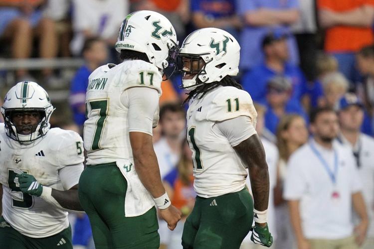 No. 5 Miami takes on No. 18 USF, and it's a matchup of quarterbacks who ...