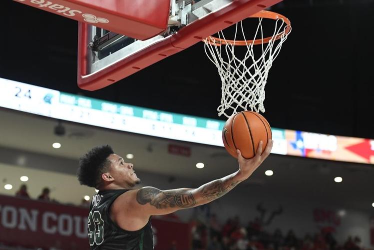 White, No. 6 Houston win 11th straight 73-62 over Tulane