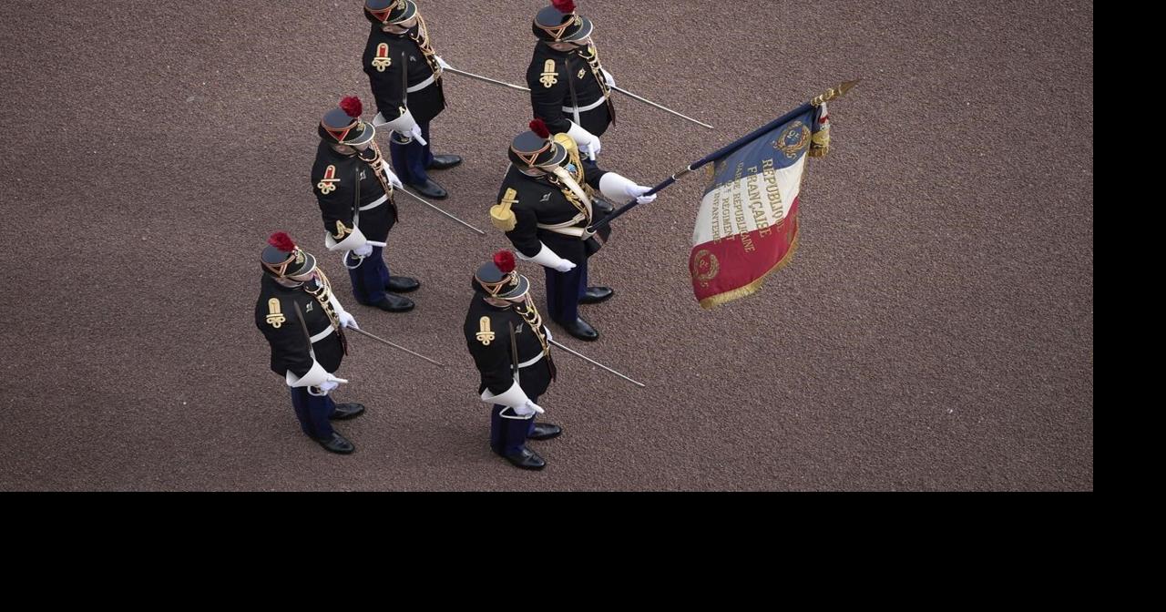 British, French troops march in historic joint parades in London and ...