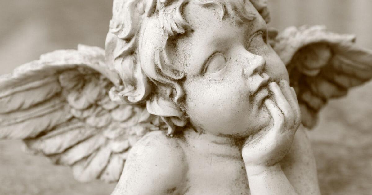 How should an atheist behave at a religious funeral